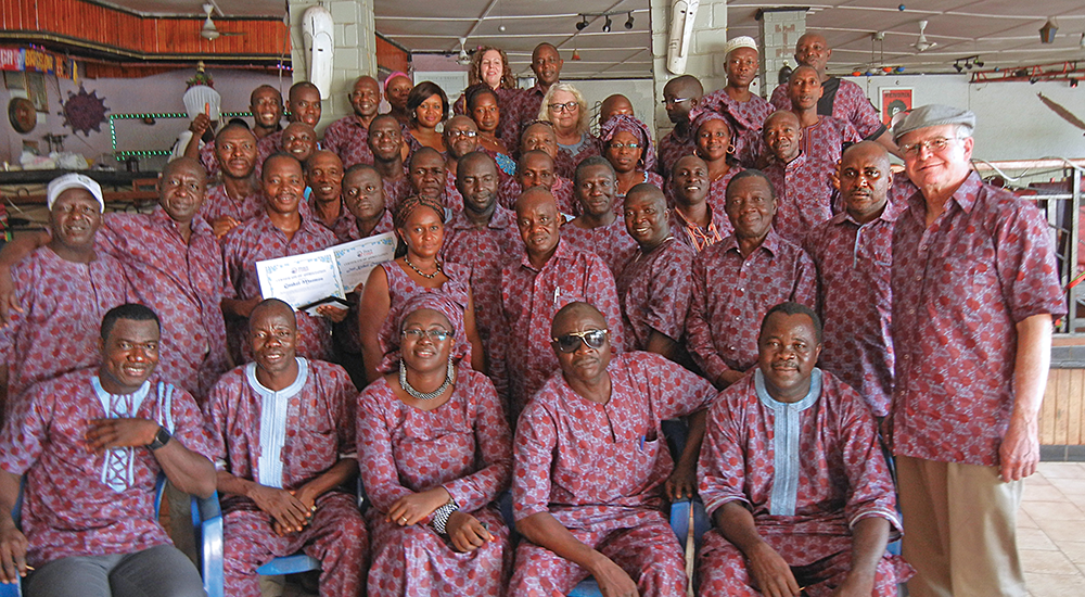 The Peace Corps Guinea staff and Doug Teschner (standing, far right ...